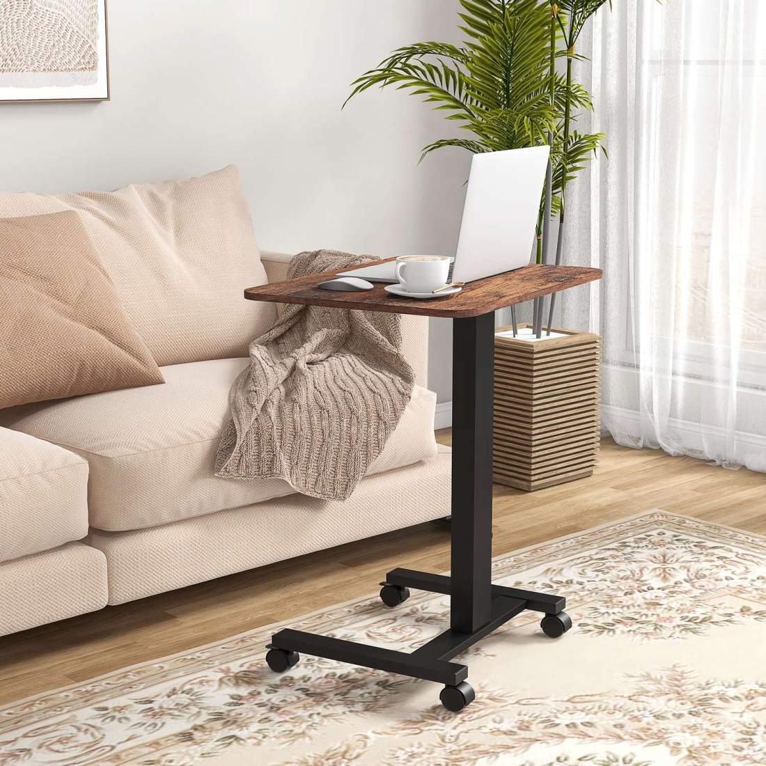 Height-adjustable laptop table with wheels and brake