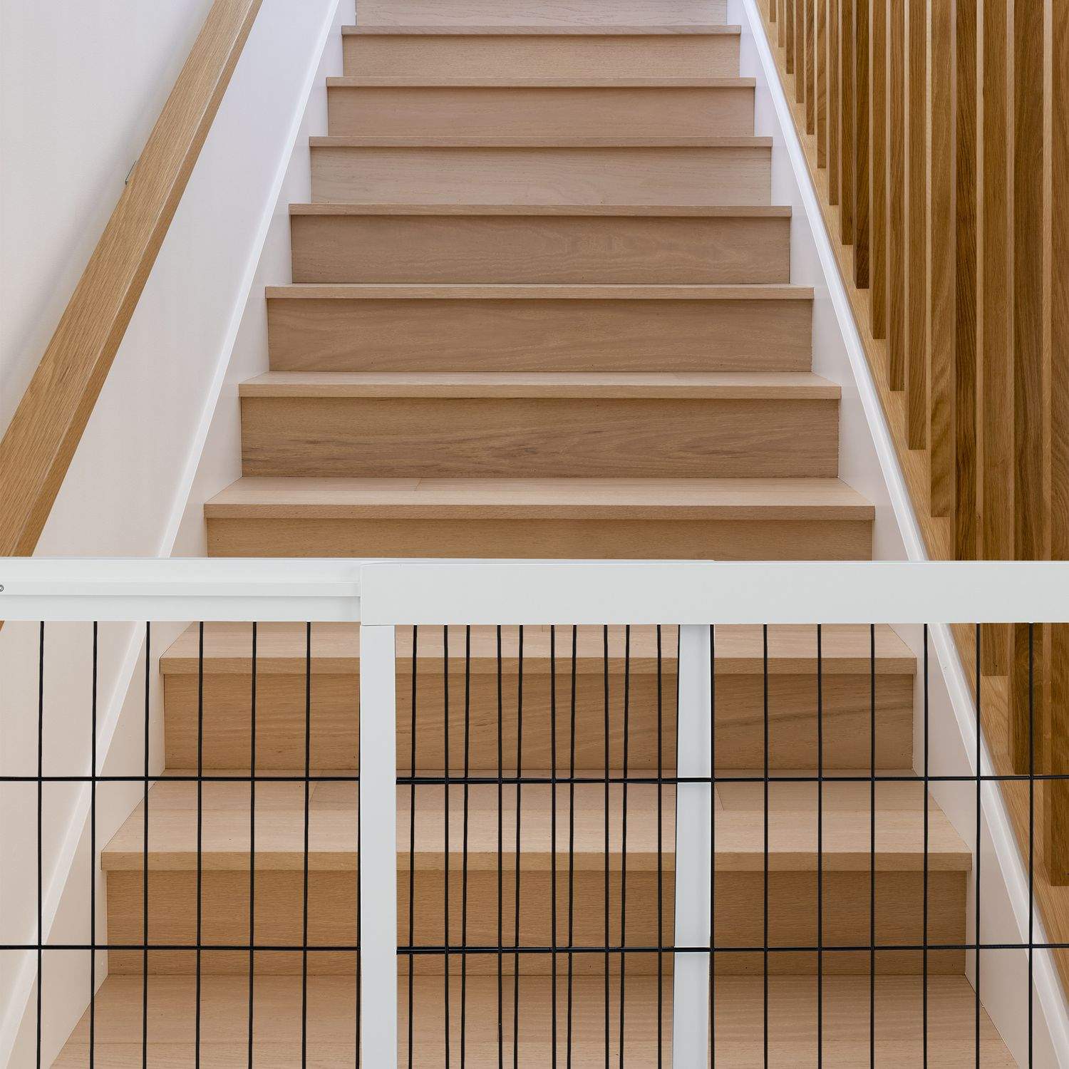 White retractable security gate