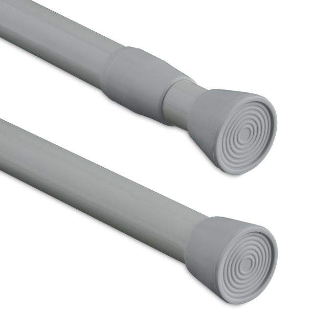 pDen grå spændingsstang tilbyder en alsidig løsning til ophængning af gardiner, badeforhæng og ...