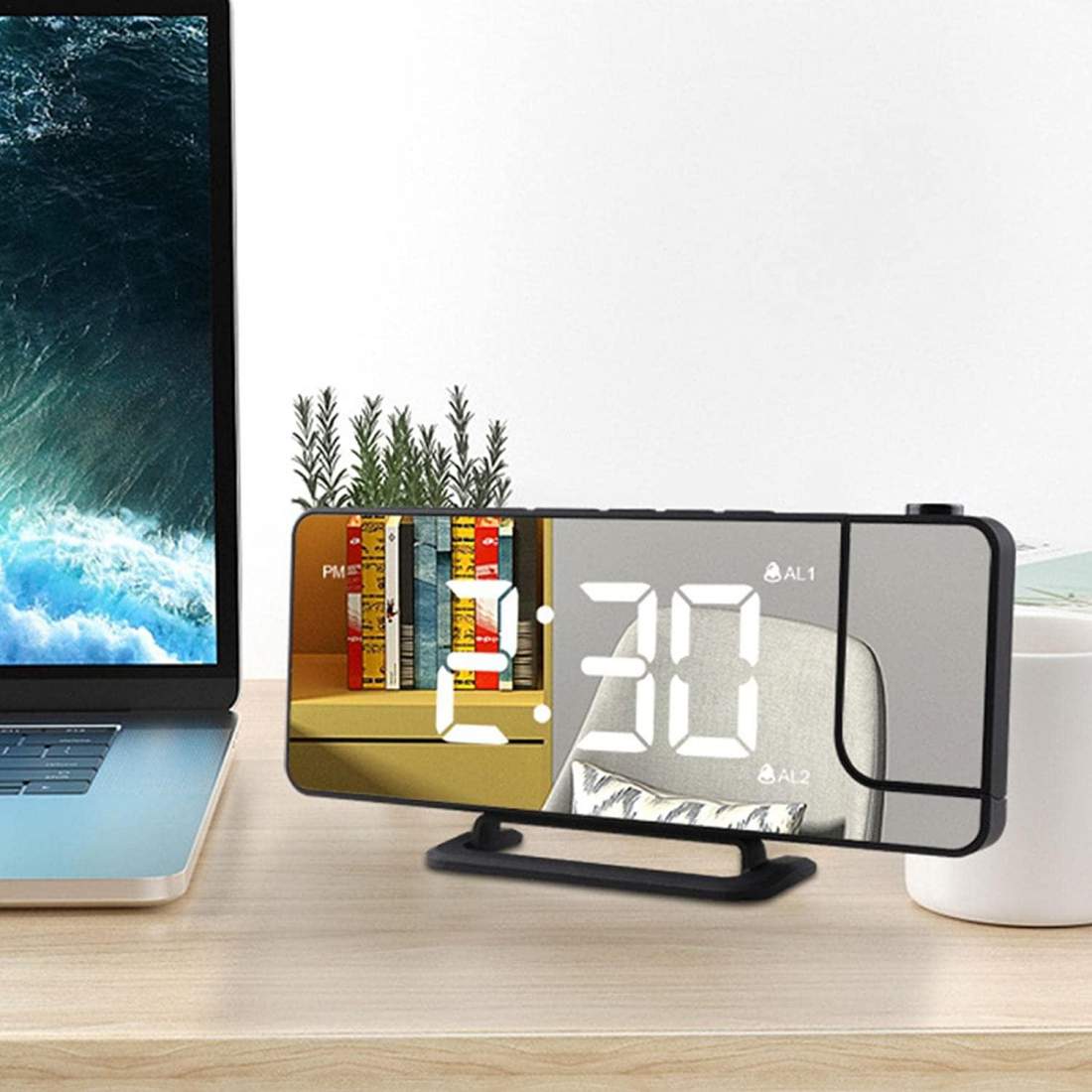 Alarm clock with projector and mirror