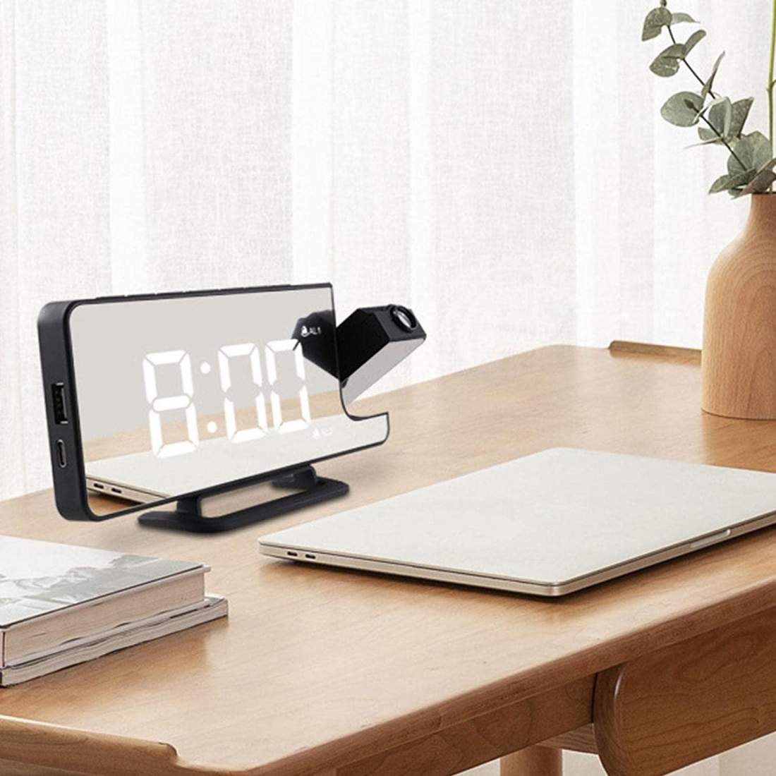 Alarm clock with projector and mirror